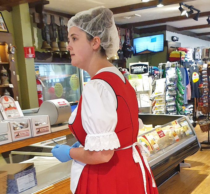 Traditional Swiss attire meets modern cheese expertise. These folks know their curds and whey better than Little Miss Muffet ever did.
