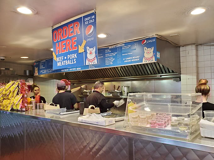 Where sandwich artistry meets assembly line efficiency. The staff moves with the practiced precision of people who know they're creating something extraordinary.