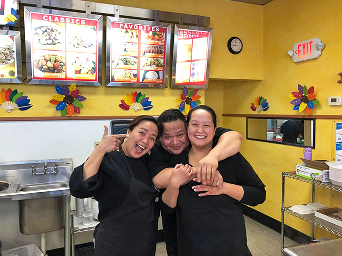 The heart of any great restaurant is its people. The genuine smiles here suggest they know they're creating memories, not just meals.