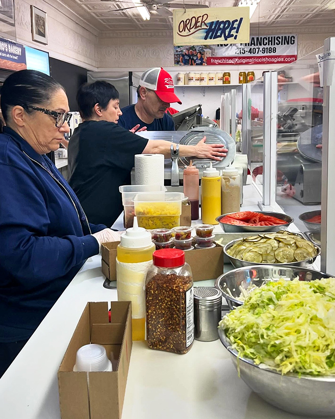 Behind the counter, the sandwich assembly line operates with the precision and focus of a NASA launch&mdash;fresh ingredients awaiting transformation.