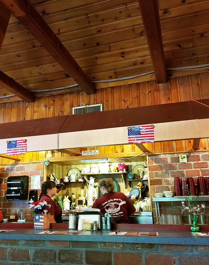 The open kitchen design lets you watch breakfast magic happen. Those wooden beams have witnessed countless "mmms" and "ahhhs" over the years.