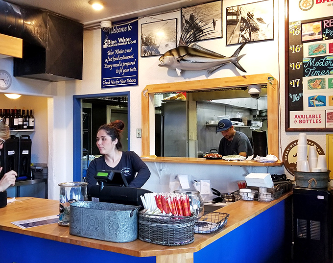 Where the magic happens. The mounted fish on the wall isn't decoration&mdash;it's supervision. Quality control from the afterlife ensuring seafood perfection.