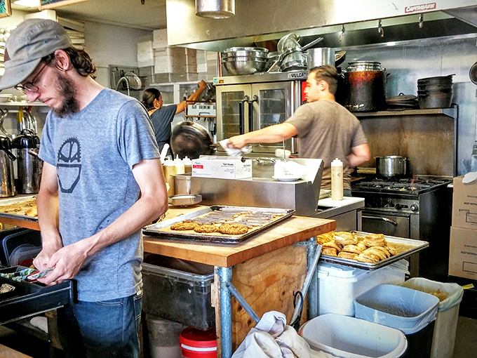 Behind the scenes, culinary magic happens with focused precision&mdash;these aren't just bakers, they're breakfast artists at work.