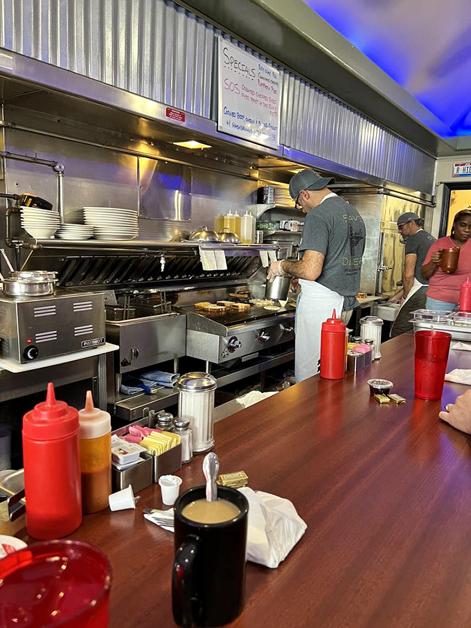 The kitchen ballet in full swing&mdash;where short-order magic happens at the hands of cooks who know exactly what you need before you do.