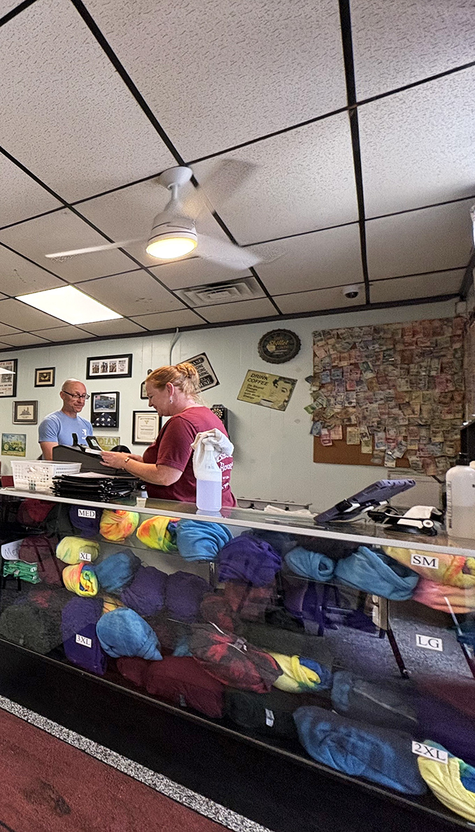 Where the magic happens. That wall of business cards tells you everything—people don't just eat here, they become evangelists.