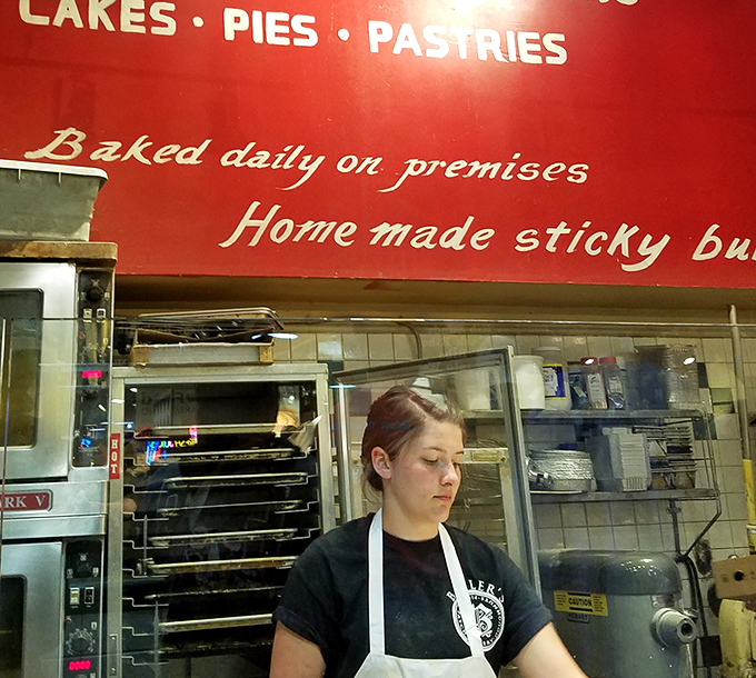 The bakers work with the precision of surgeons and the creativity of artists, crafting edible joy one donut at a time.