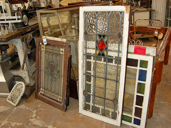 Stained glass windows: because sometimes your home needs jewelry too. Each panel captures light the way smartphones never will.