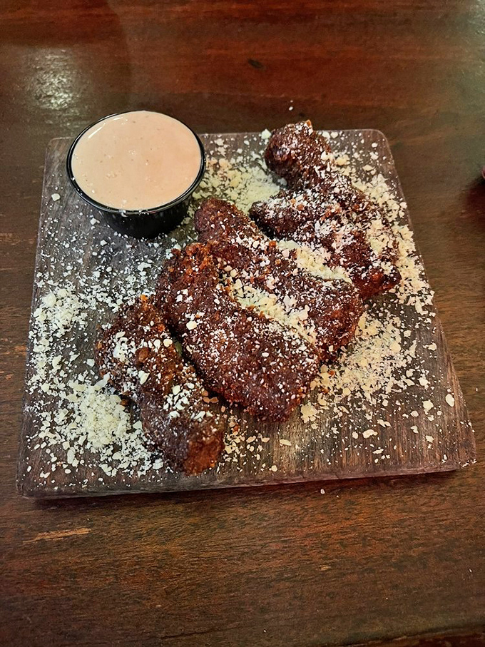 Chocolate decadence dusted with powdered sugar&mdash;dessert that would make even the toughest gunslinger put down his weapons and pick up a fork.