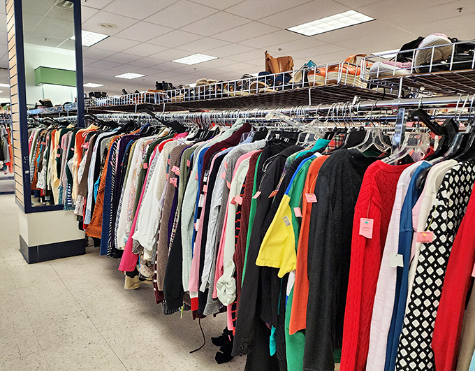 The rainbow of hanging garments isn't just clothing&mdash;it's potential identities waiting to be adopted for less than a fancy coffee.
