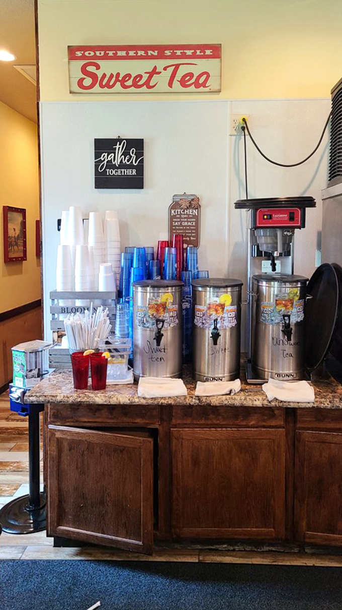 Southern Style Sweet Tea station&mdash;because in Florida, tea without sugar is just brown water. The "Gather Together" sign says it all.