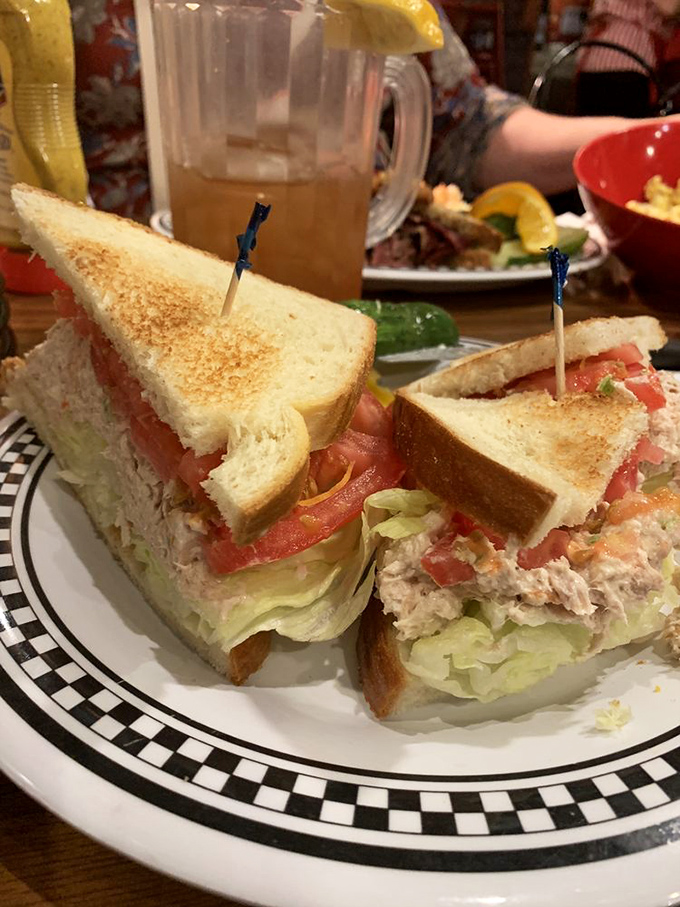 A tuna sandwich that doesn't whisper "healthy choice"—it shouts "vacation mode activated!" with every layer of fresh veggies and creamy tuna.