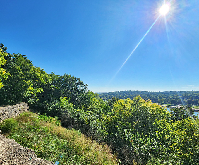 Mother Nature showing off her landscaping skills with this sweeping vista. The sun's spotlight effect is pure theatrical genius.