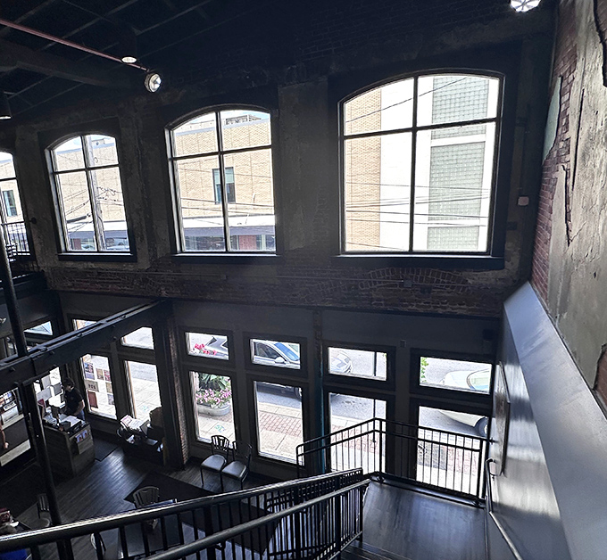 The view from above reveals the architectural drama of this transformed space&mdash;where history meets contemporary dining in perfect harmony.