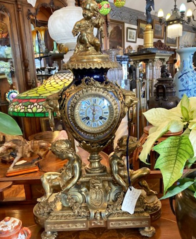 Time literally stands still in this elaborate gilt clock, a masterpiece of craftsmanship that turns timekeeping into an art form.