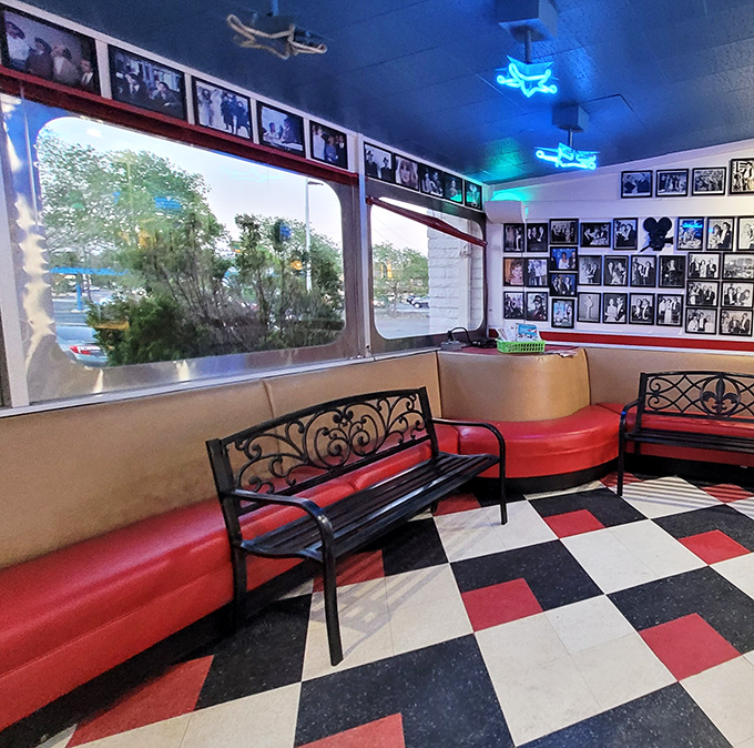 The waiting area's blue ceiling dotted with neon stars reminds you that in the Galaxy Diner universe, even waiting for a table is part of the adventure.