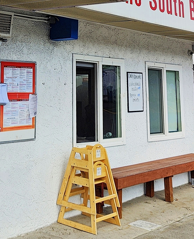 The wooden bench outside isn't just seating&mdash;it's where strangers become temporary neighbors united by the universal language of hunger.