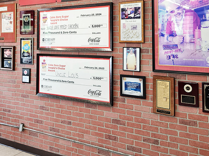 Those award checks on the wall aren't just decoration&mdash;they're proof that sometimes the universe does reward exceptional fried chicken.