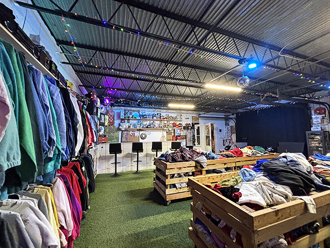 Artificial turf indoors because why shouldn't vintage shopping feel like a backyard barbecue from 1975?