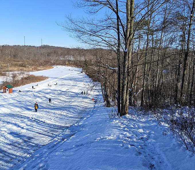 Winter transforms Punderson's slopes into a playground where gravity becomes your favorite ride designer and laughter echoes across the snow.