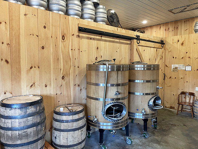 Wooden fermenters standing like sentinels of flavor. Whatever's brewing in there, I'm already mentally clearing my schedule.