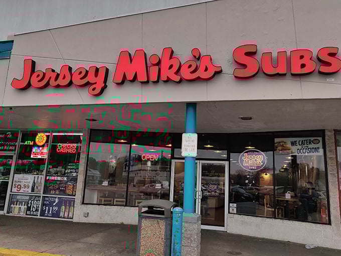 Jersey Mike's bright red signage promises East Coast sub authenticity. Some chain restaurants actually get it right!