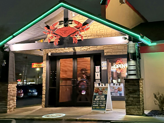The Juicy Seafood's entrance glows with neon promise &ndash; like Vegas for seafood lovers.
