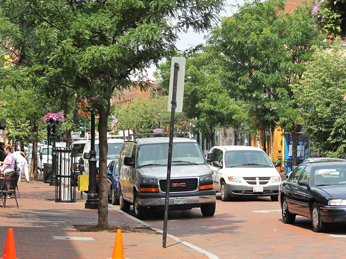 Annapolis streets where midshipmen march in formation while tourists stroll in happy confusion. 