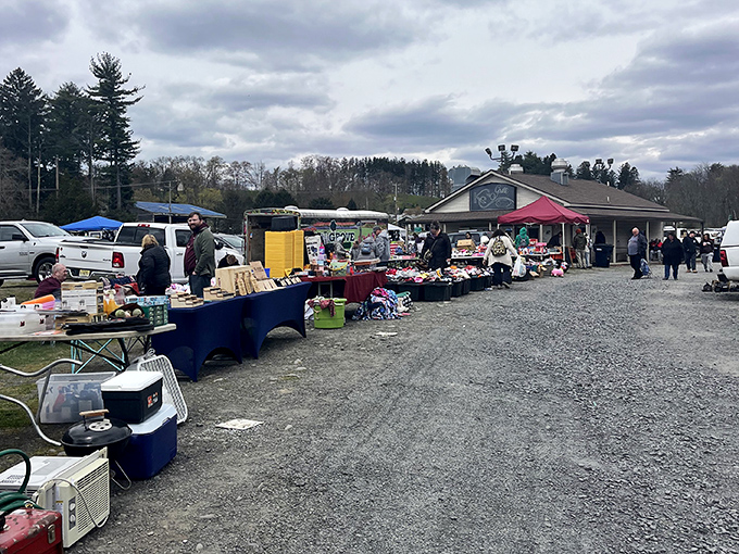 The Carhartt sign stands sentinel at Blue Ridge Market, where practical meets whimsical across acres of tables and tents.