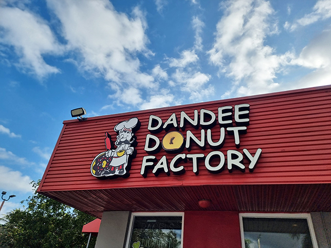 The chef knows his stuff! Dandee's cheerful mascot promises handcrafted delights under Florida's blue skies.