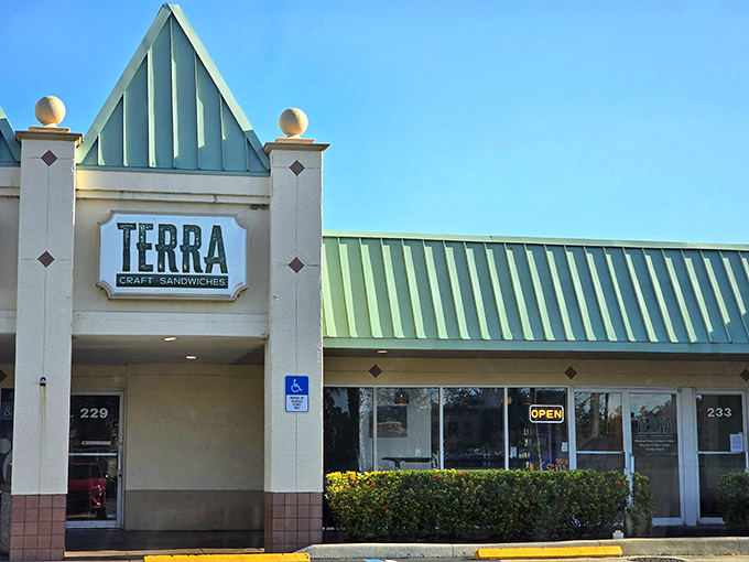 The distinctive green roof shelters sandwich artists who elevate lunch from necessity to indulgence.