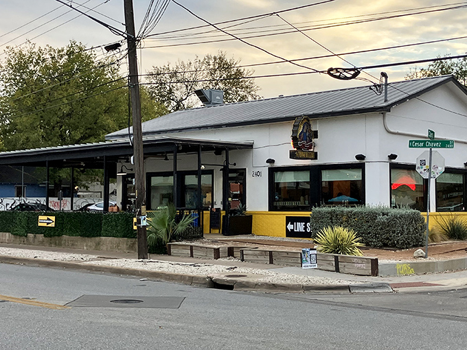 East Austin's creative spirit shines through this vibrant storefront, promising barbecue with serious artistic flair inside.