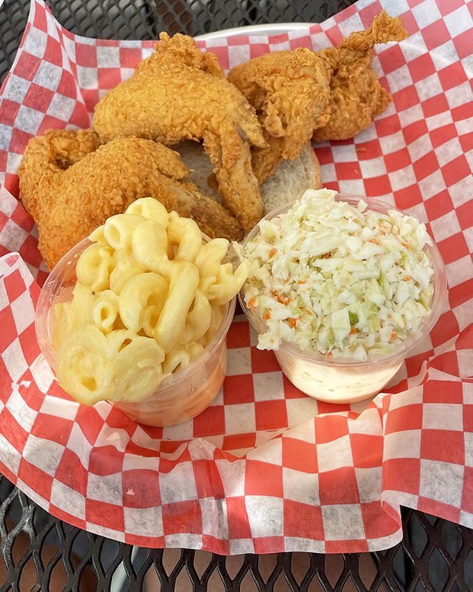 This isn't just fried chicken&mdash;it's edible art. The mac and cheese and coleslaw aren't sides; they're supporting actors in a culinary masterpiece.
