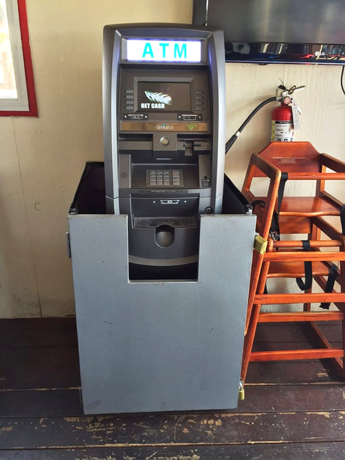 Even paradise needs practicality. The ATM stands ready for those who forgot that some of life's greatest pleasures still require cash.