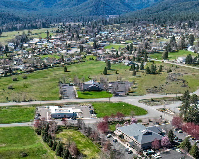 Valley views that make you understand why people choose quality of life over convenience. That patchwork of green is nature's quilt.