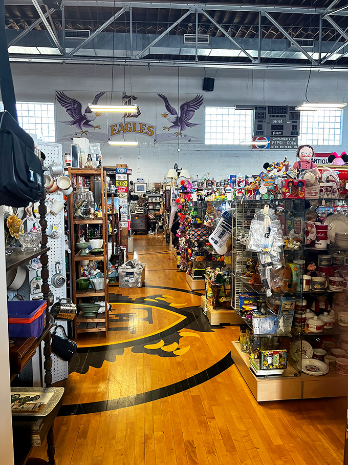 The polished gymnasium floor and Eagles mascot remind us that this building had a previous life before becoming treasure-hunt central.