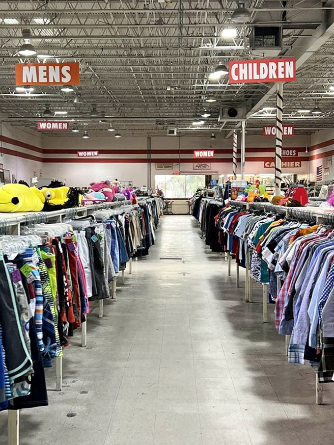 Organization is key in this treasure labyrinth. The clear signage overhead prevents shoppers from getting lost in the sea of secondhand splendor. 