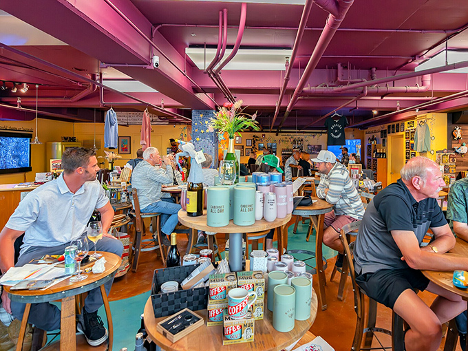 Inside Alapay Cellars, wine tasting becomes a social sport where strangers become friends over shared pours and ocean-kissed breezes.