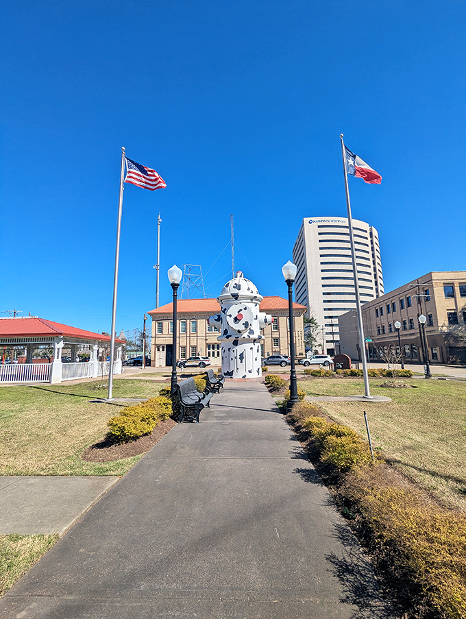 Framed by flags and flanked by history, this towering tribute makes every day feel like a celebration.
