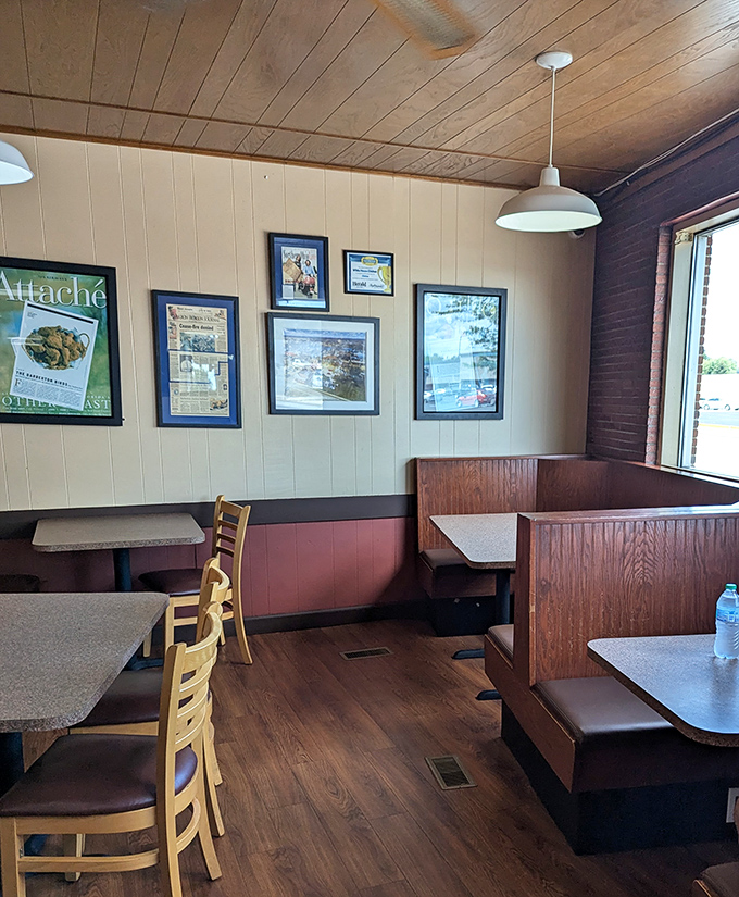 Wood paneling, simple booths, and walls of accolades - the dining room equivalent of your favorite uncle's den.