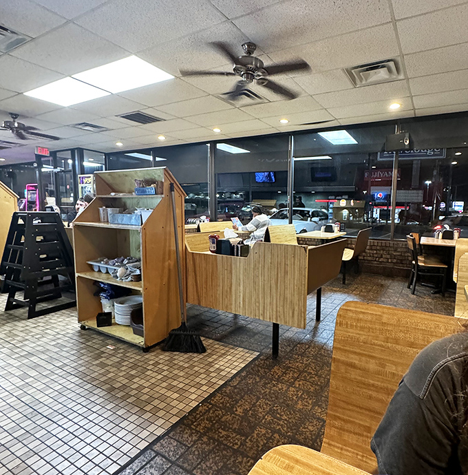 The late-night diner atmosphere captured perfectly&mdash;tile floors, booth dividers, and that distinct feeling that good food is coming your way. Midnight philosophers have solved world problems in places just like this.