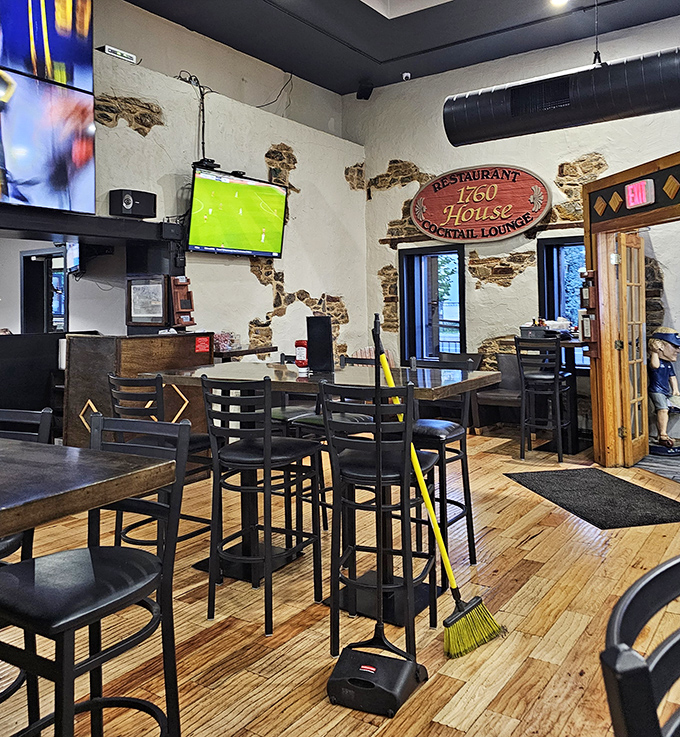 Exposed brick and wooden accents create a space that feels simultaneously historic and contemporary &ndash; much like the menu itself.