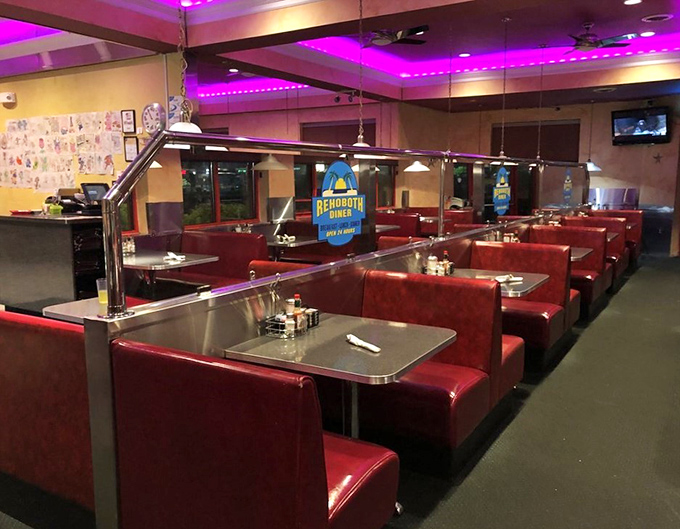 Purple accent lighting adds unexpected pizzazz to traditional diner charm without overwhelming the cozy atmosphere.