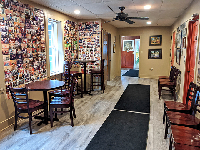 Photos of triumphant diners line the walls like a hall of fame for those who came, saw, and devoured.