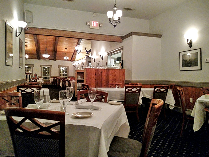 Another dining area combines coastal elegance with old Florida charm. The kind of place where you can wear flip-flops or heels and feel equally at home.