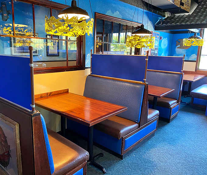 Blue walls and wooden accents create that "just stepped onto a fishing boat" vibe, minus the seasickness and with much better food options.