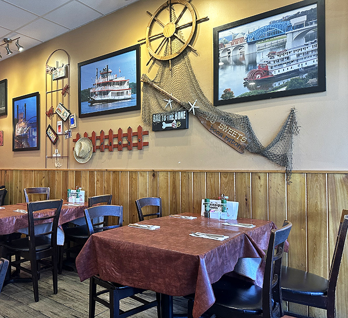 Nautical touches and wooden accents create an atmosphere that's part riverboat, part smokehouse, and entirely inviting.