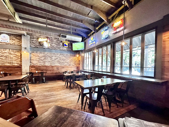 Another angle reveals the thoughtful design &ndash; brick walls and wooden tables creating a space where wine country sophistication meets barbecue joint authenticity.