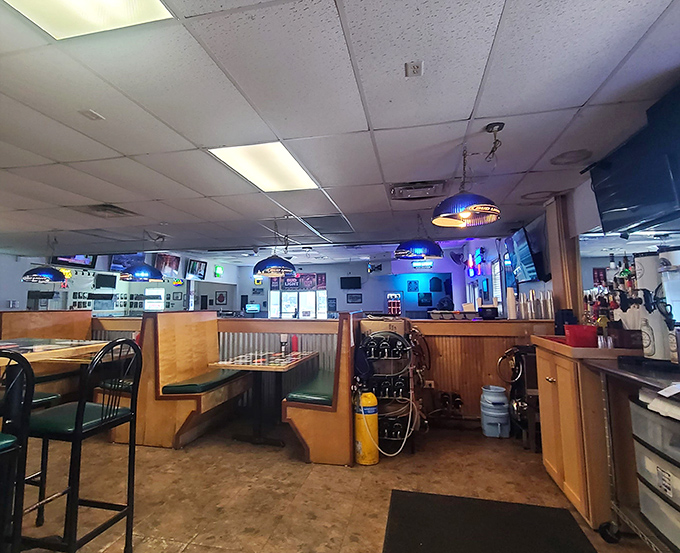 The soft glow of neon beer signs illuminates wooden booths where countless birthdays, first dates, and "just because" meals have unfolded.