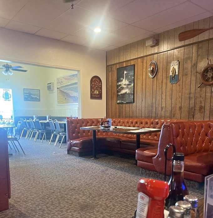 Wood-paneled walls and nautical touches create that authentic coastal dining atmosphere without the tourist trap.
