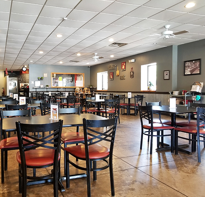 Spacious, casual, and ready for hungry crowds. The kind of dining room where "just one more slice" becomes the evening's mantra.